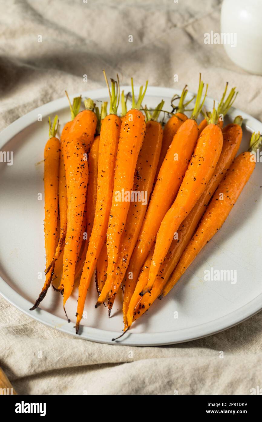 Raw Orange Organic Whole Roasted Carrots with Salt and Pepper Stock ...