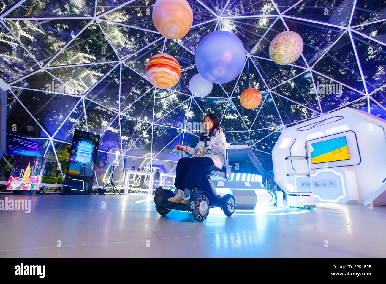 FUZHOU, CHINA - APRIL 25, 2023 - People experience metauniverse ...