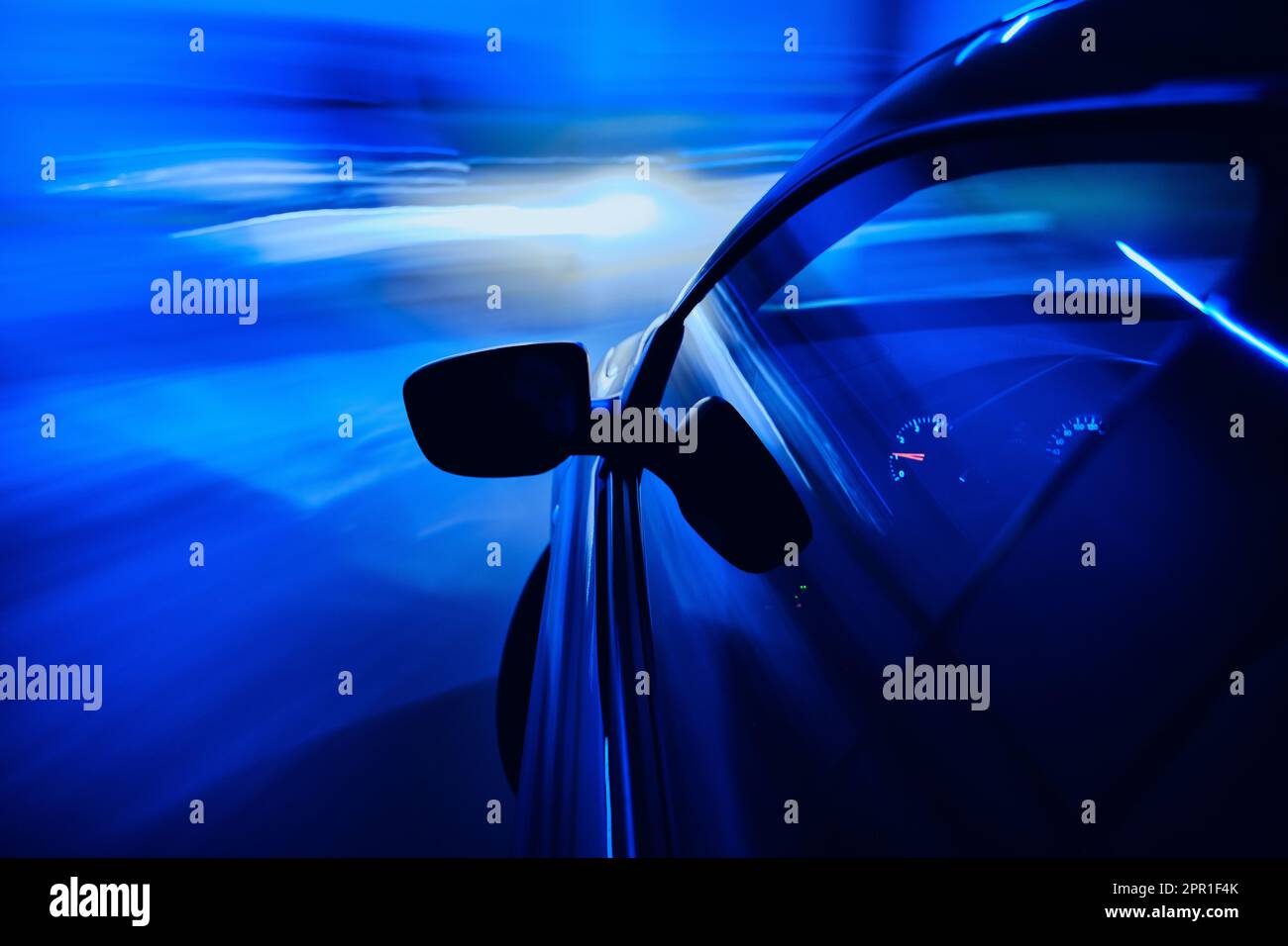 Motion timelapse of a speedy night drive in a big city ending in the ...