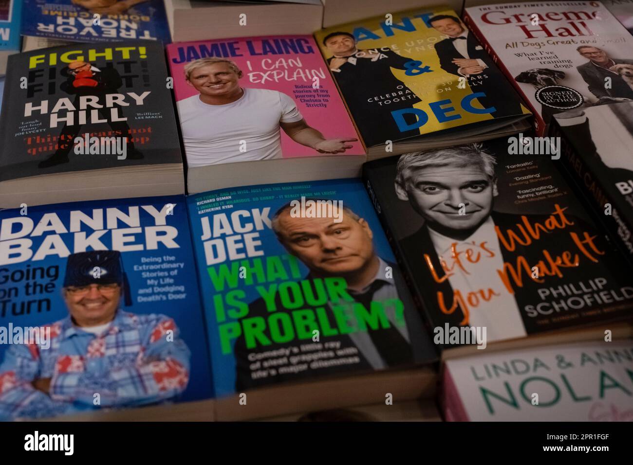 Philip Schofield Jack Dee, Books for sale on a table display Stock Photo - Alamy
