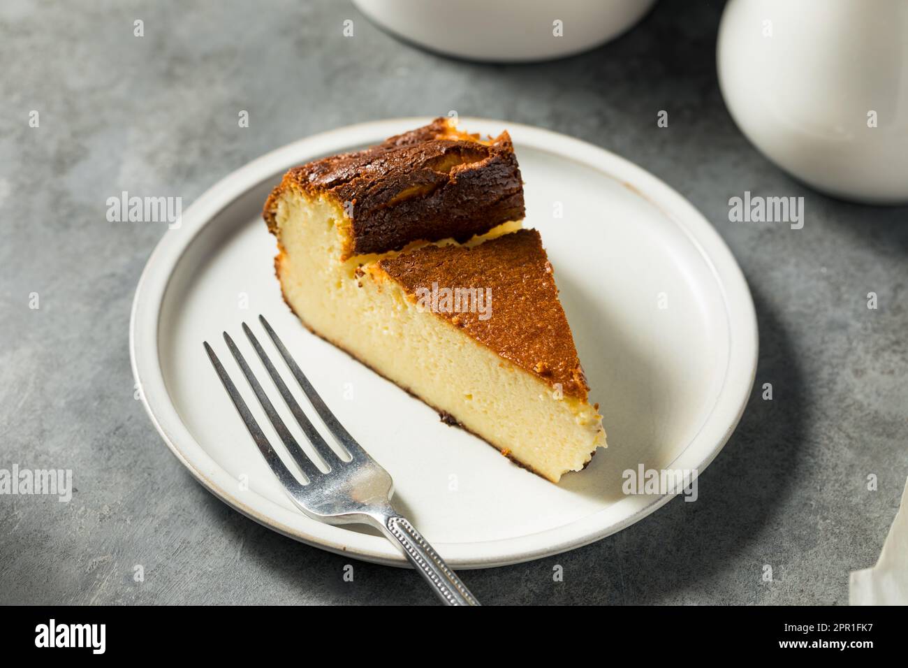 Baked Burnt Basque Cheesecake in a Pan Ready to Eat Stock Photo - Alamy