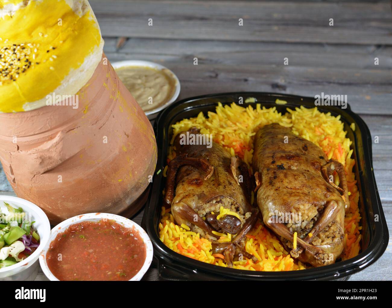 Background of Egyptian Hamam pigeons Mahshi stuffed squab with rice and ...