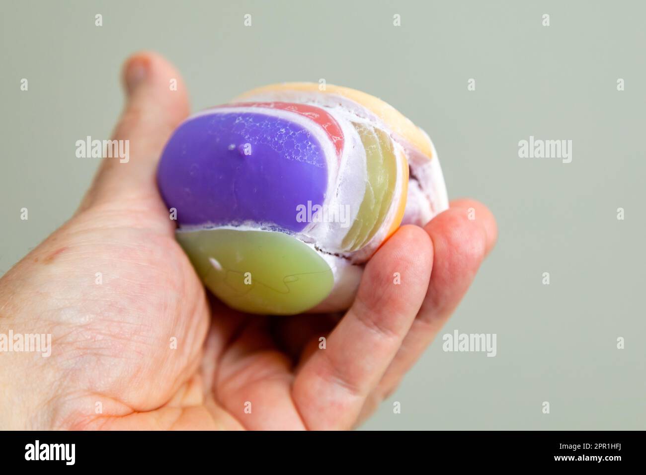 Ball of Used Soaps of different colors. economy and use Stock Photo - Alamy