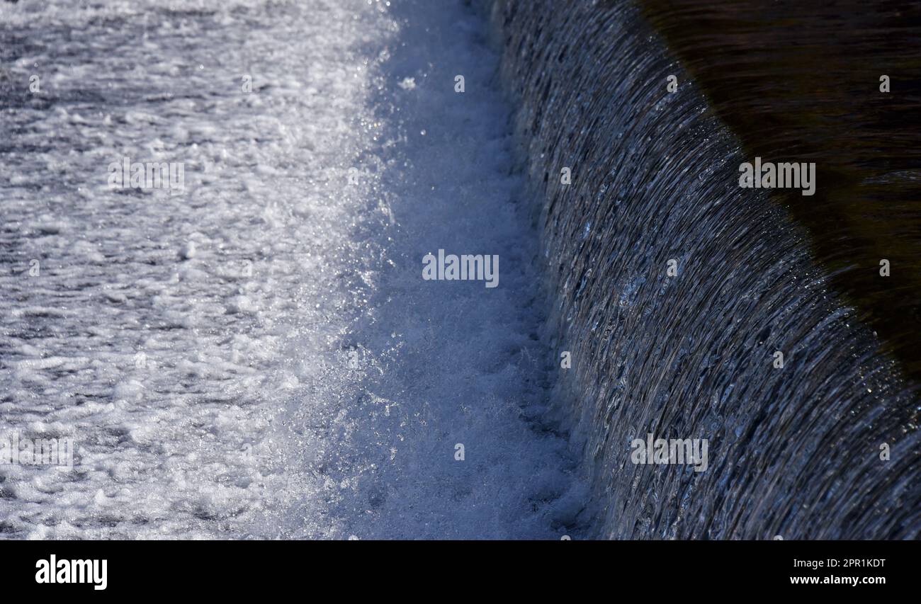 Doe River cascades over the concrete dam in Elizabethton, Tennessee ...