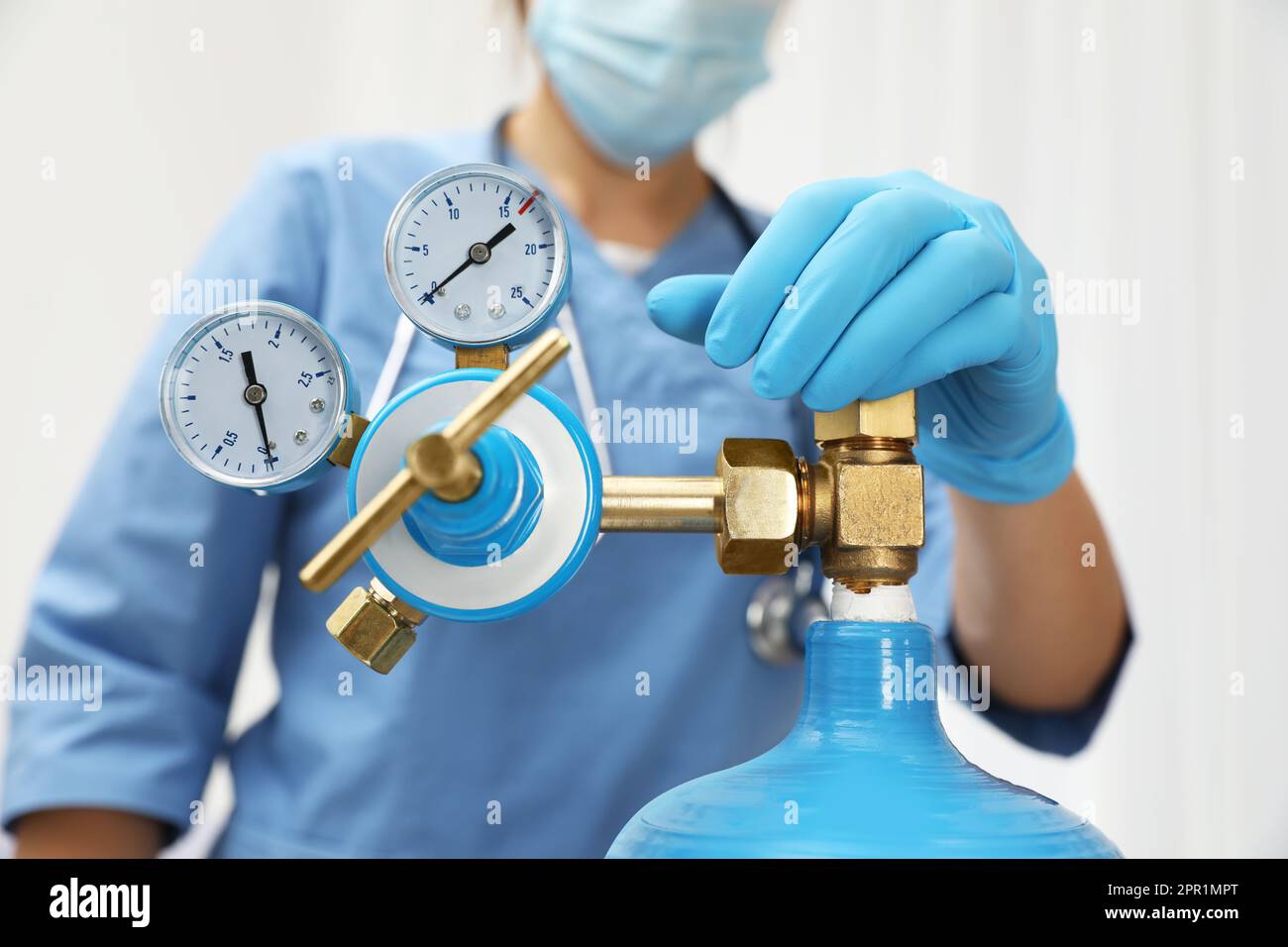Medical worker checking oxygen tank in hospital room, closeup Stock ...