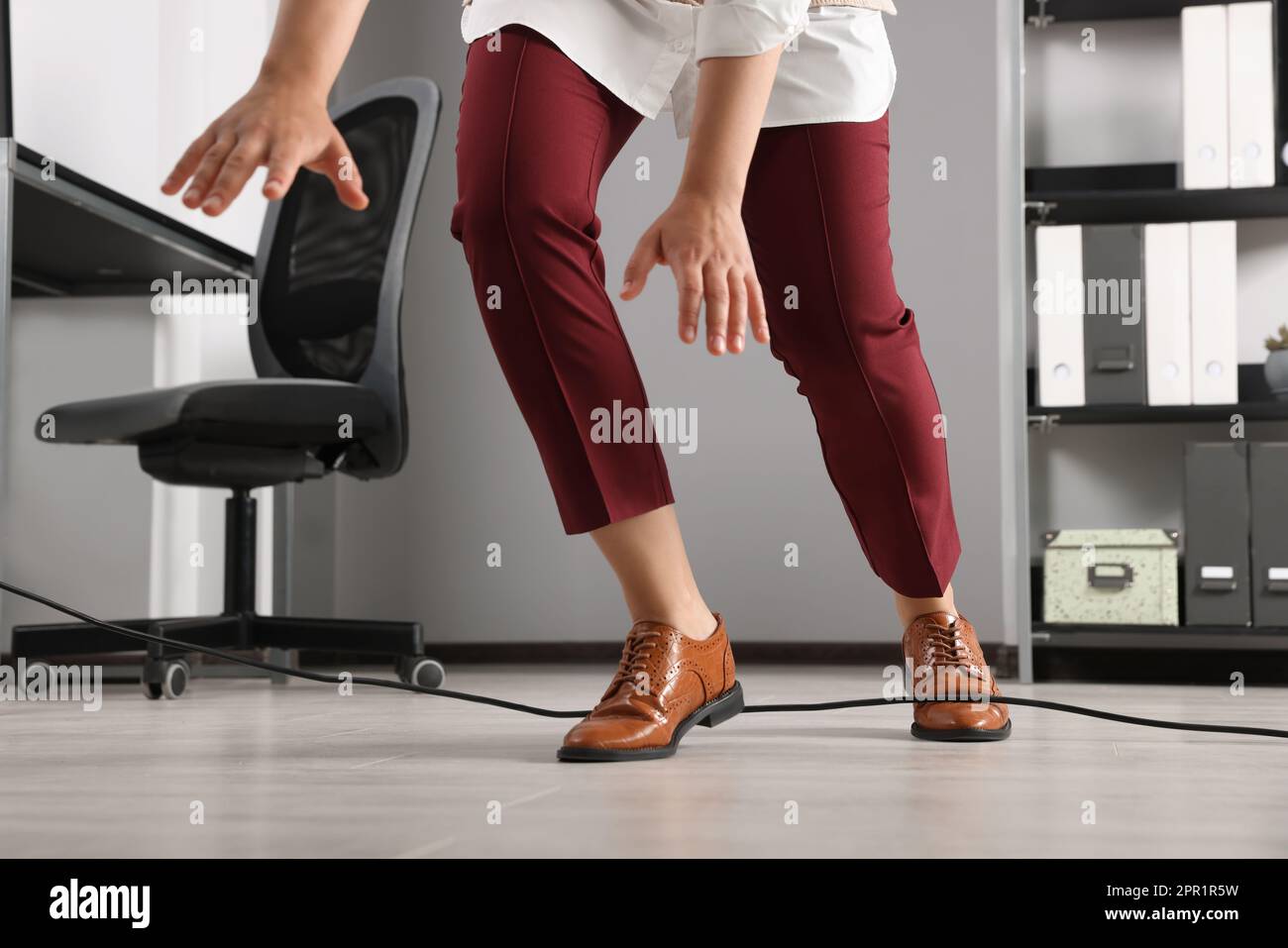 Tripping hazard office hi-res stock photography and images - Alamy