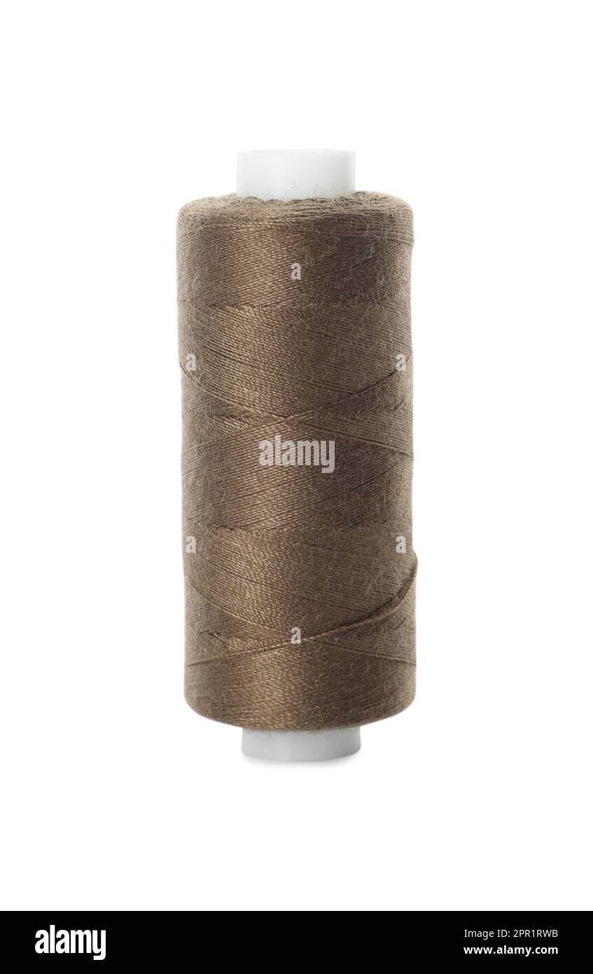 Spool of brown sewing thread isolated on white Stock Photo - Alamy