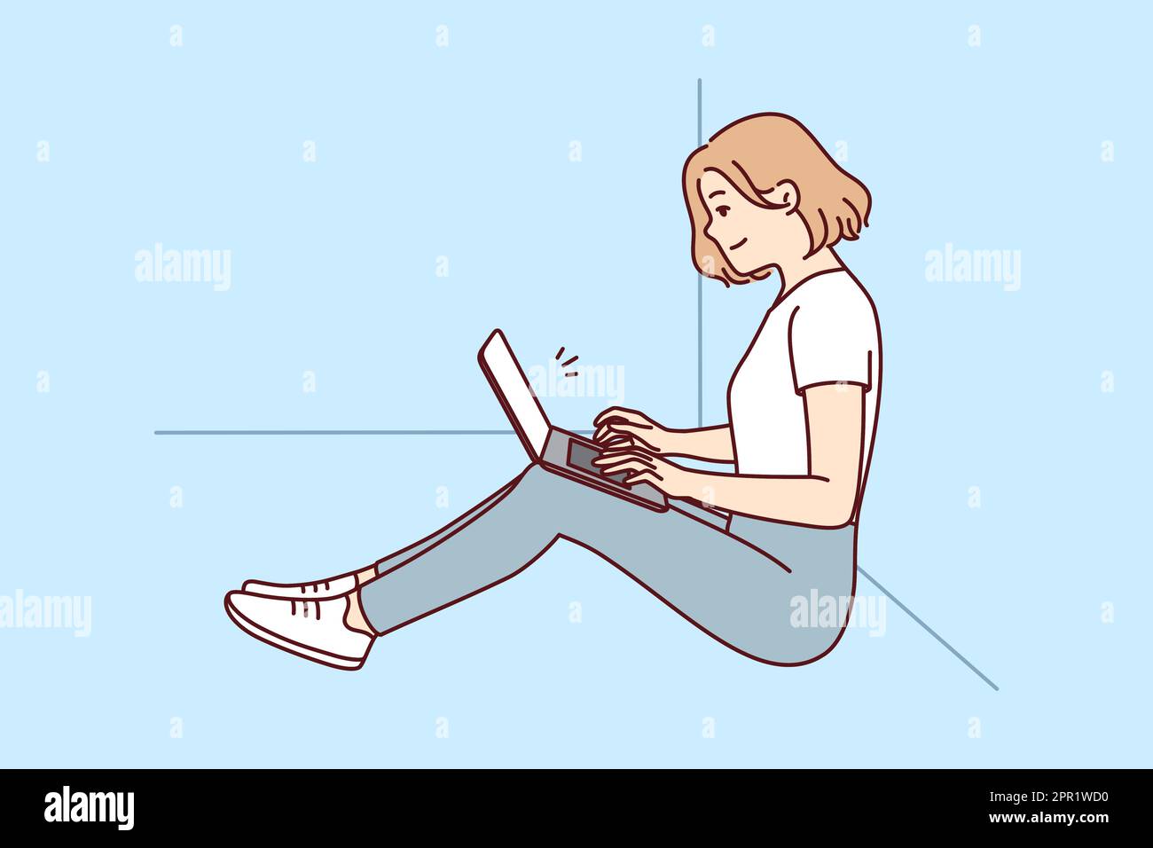 Positive woman freelancer sitting on floor near wall with laptop on lap ...