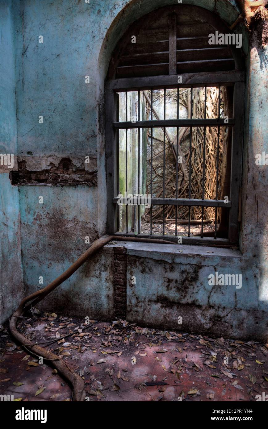 indoor scene of the deserted and dilapidated colonial building Stock ...