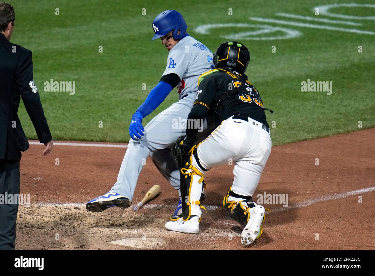Pittsburgh Pirates catcher Jason Delay, right, tags out Los Angeles ...