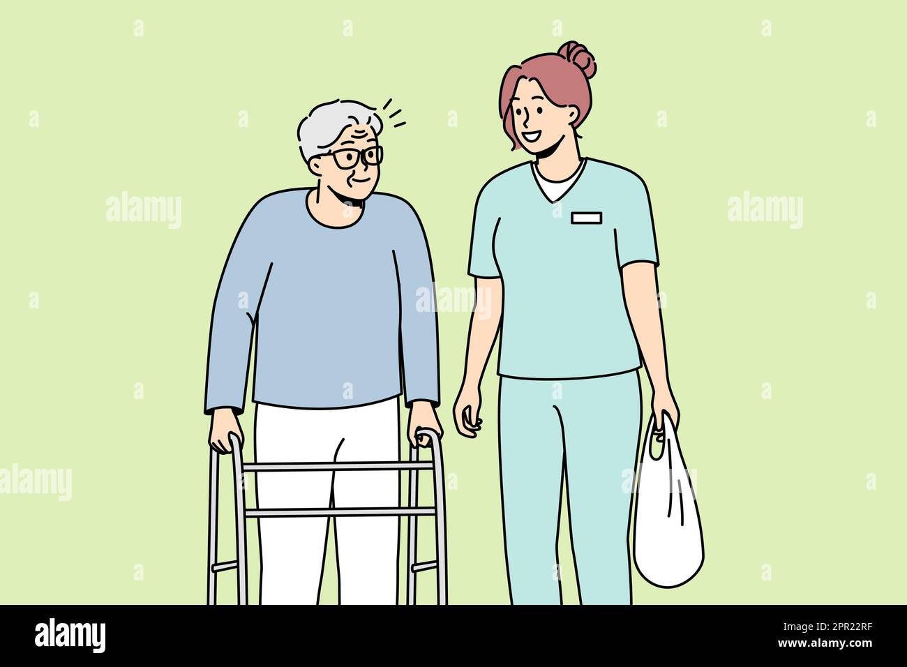 Health care worker helps elderly disabled person with walking frame ...