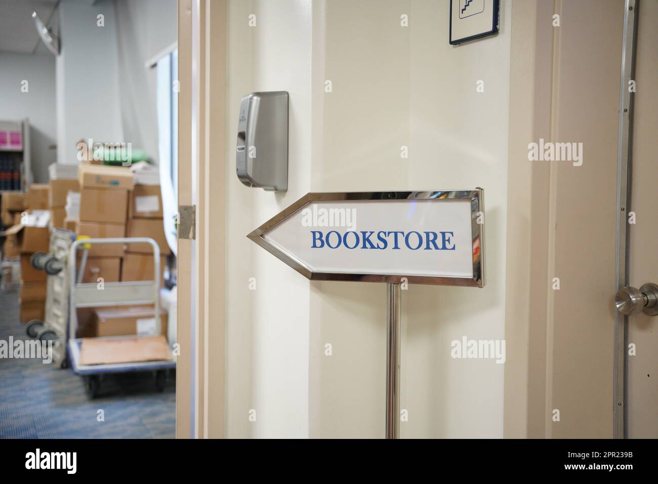 Bookstore sign inside the school or university. Bookstore arrow signs ...