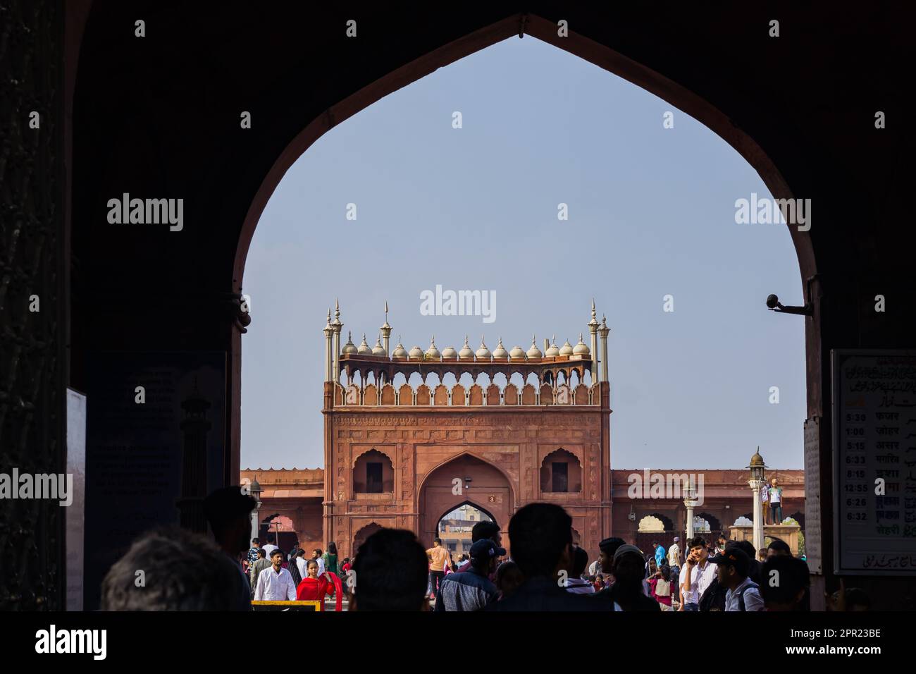 Courtyard entrance gate of jama masjid mosque made of red sandstone and ...
