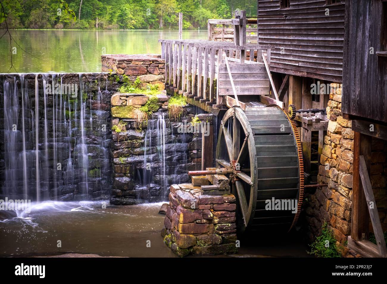 View of the millpond, waerfall, flume, and waterwheel at Historic Yates ...