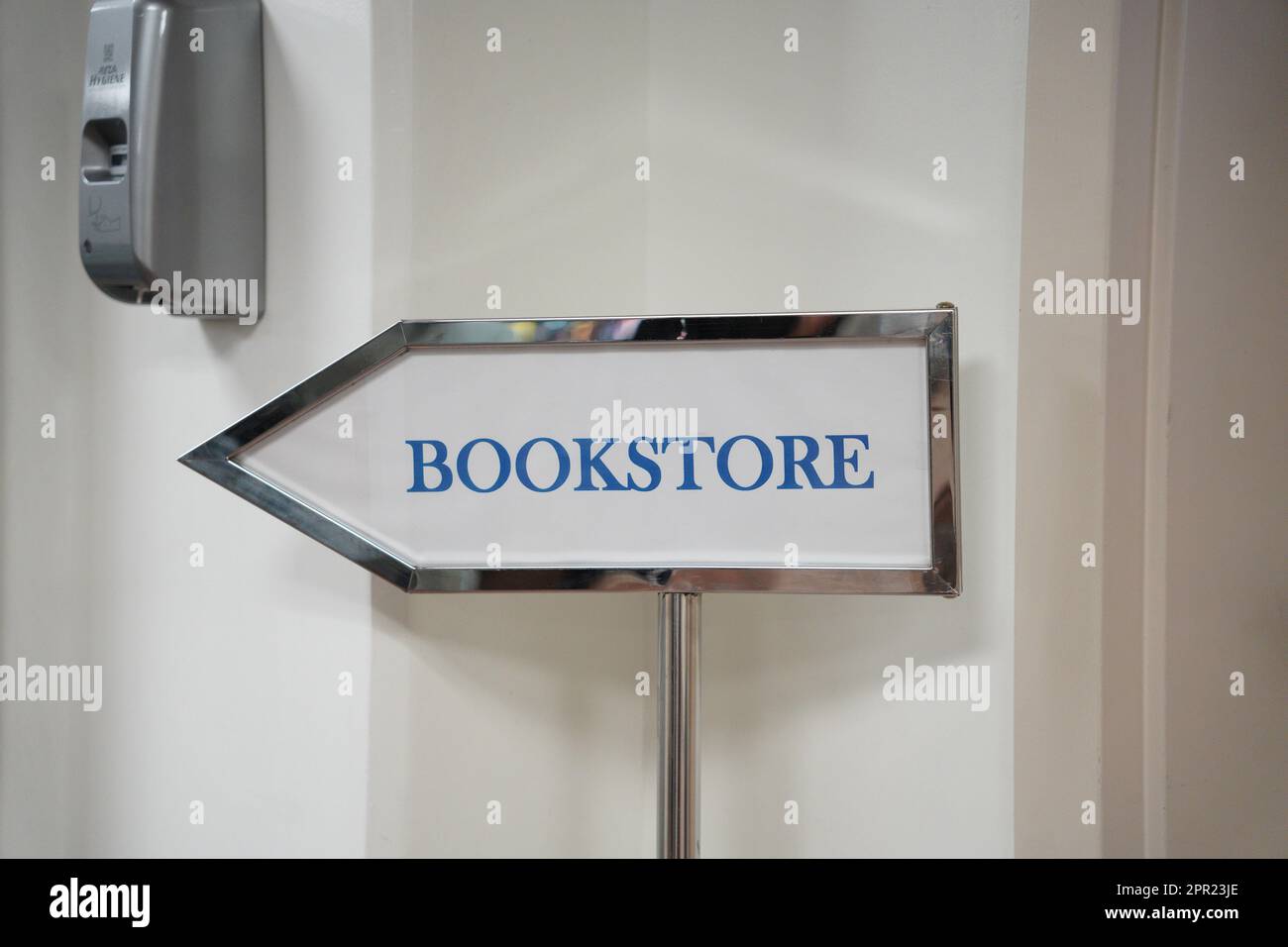 Bookstore sign inside the school or university. Bookstore arrow signs ...