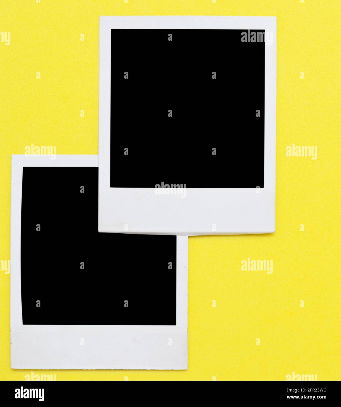 Polaroid photo frames on yellow background Stock Photo - Alamy