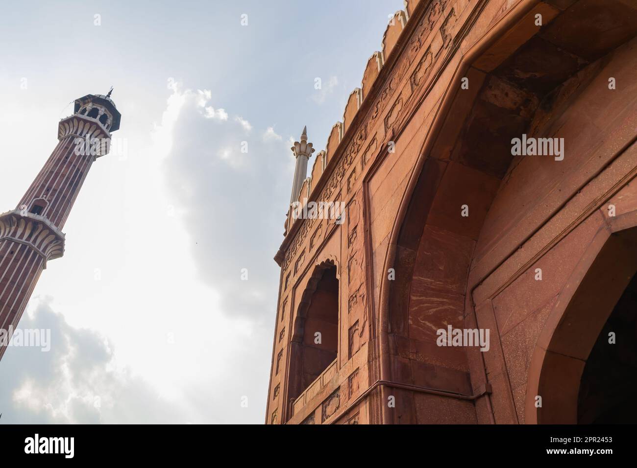 Courtyard entrance gate of jama masjid mosque made of red sandstone and ...