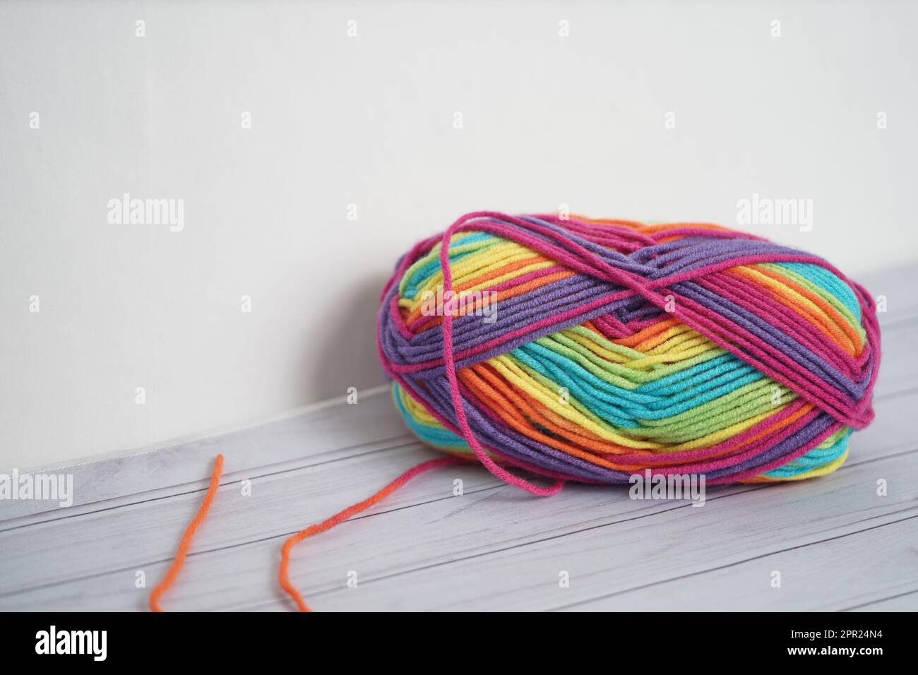 rainbow or colorful wool for crafting. art and crafts tool isolated on ...