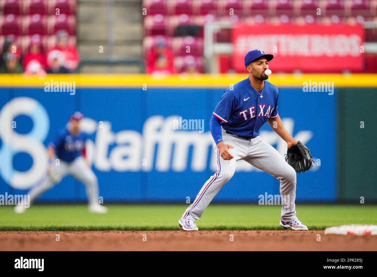 Texas Rangers second baseman Marcus Semien, right, plays in a baseball ...