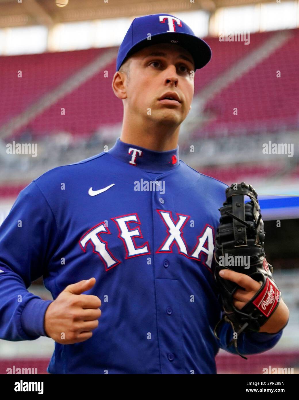 Texas Rangers first baseman Nathaniel Lowe plays in a baseball game against the Cincinnati Reds ...
