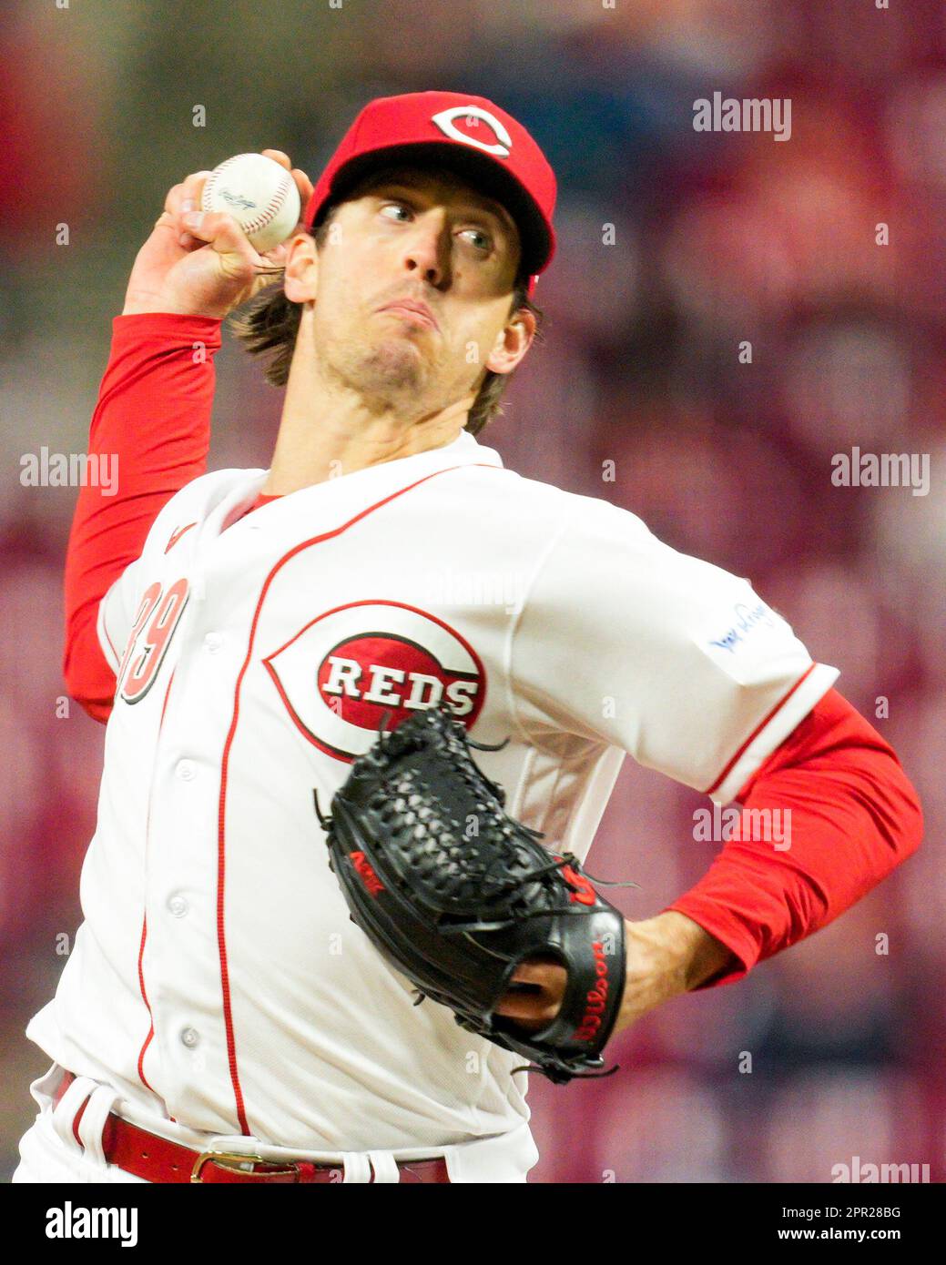 Cincinnati Reds relief pitcher Lucas Sims (39) throws in a baseball ...