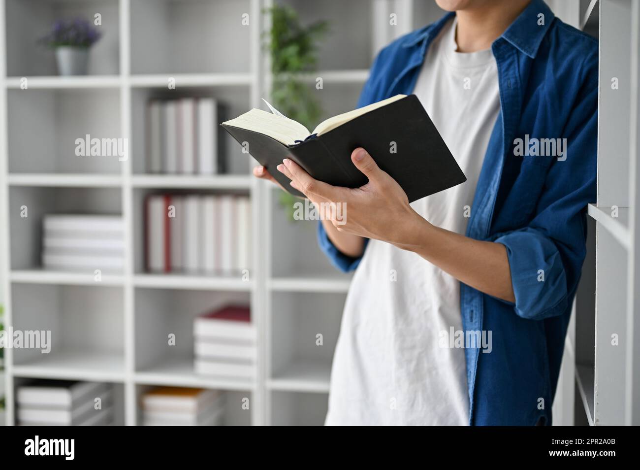 Lean in book hi-res stock photography and images - Alamy