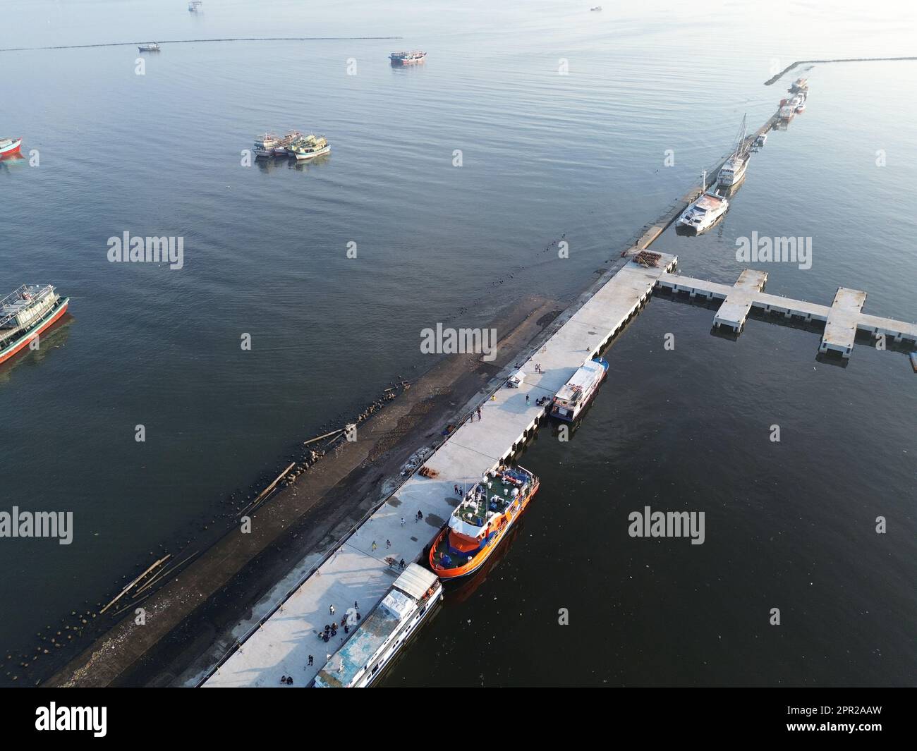 April, 24 2023, Muara Angke Pier with several small ships ready to go ...
