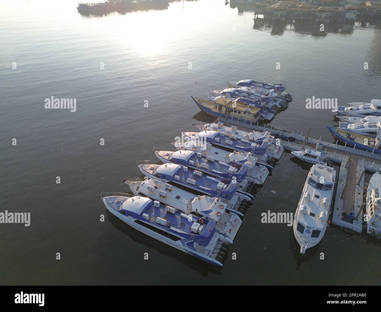 April, 24 2023, several fast passenger boats lined up off the coast of ...