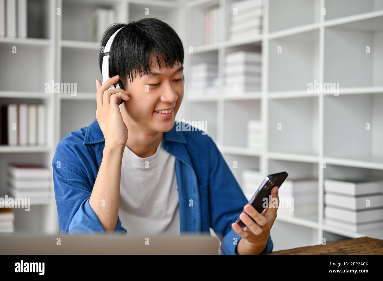 Young office dancing listening music hi-res stock photography and ...