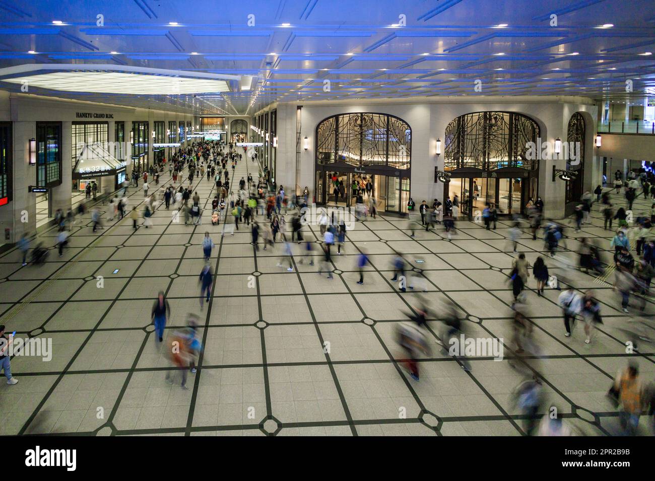 Osaka, Japan - April 6, 2023: Crowd of people walk through busy ...