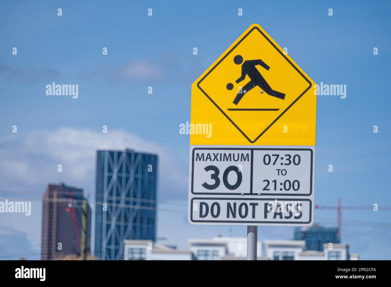 Street speed limit sign with calgary skyline in background Stock Photo ...