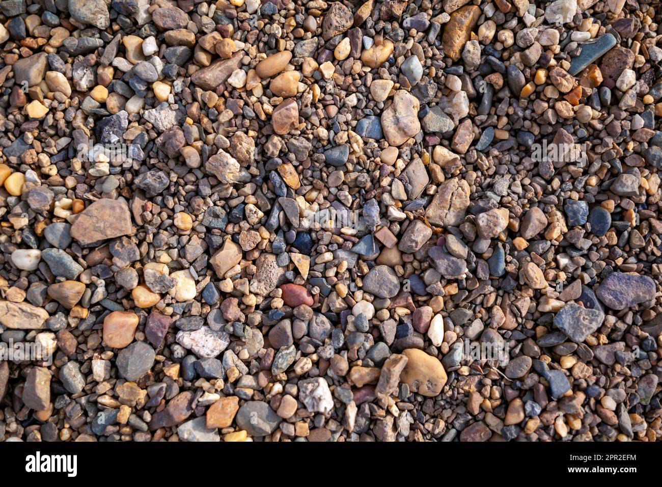 Crushed stone on the seashore. Selective focus on object. The stones ...