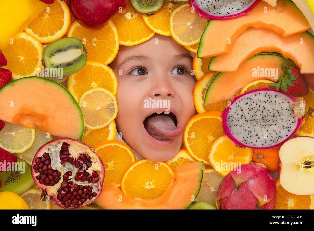 Healthy vitamins fruits. Kids face with mix of fresh frutis. Healthy ...