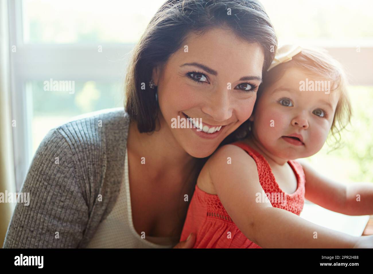 Quality time with this little cutie is the best. Portrait of a mother ...