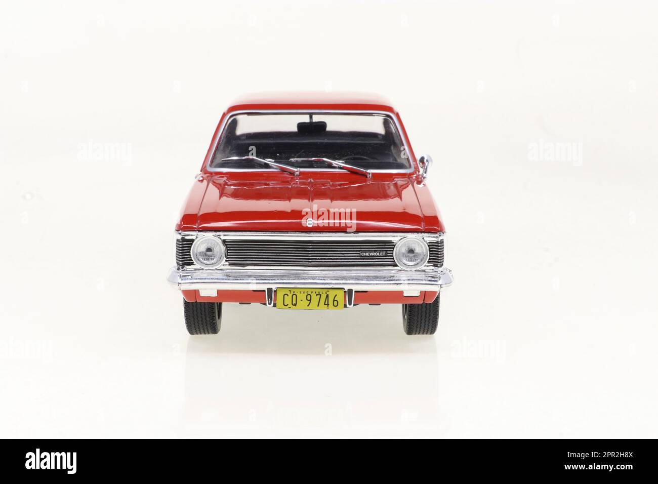 a red race car with white numbers and a number on it and toy Stock ...