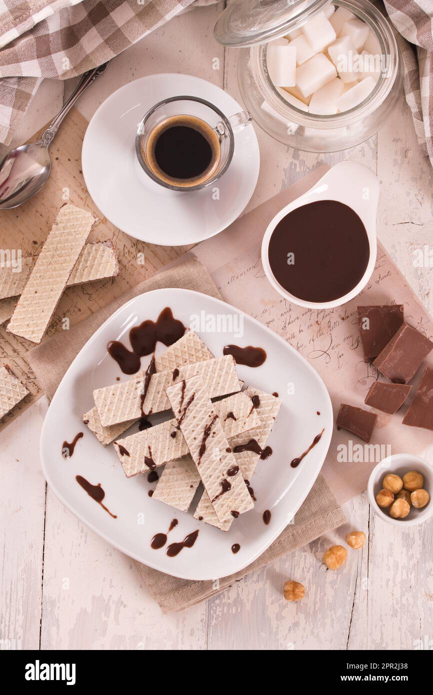 Neapolitan wafers filling with hazelnut-chocolate cream Stock Photo - Alamy