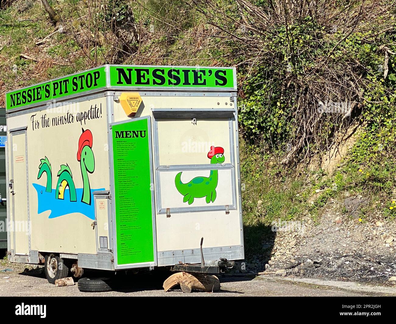 Drumnadrochit, UK. 20th Apr, 2023. A bistro car with Nessie advertising ...