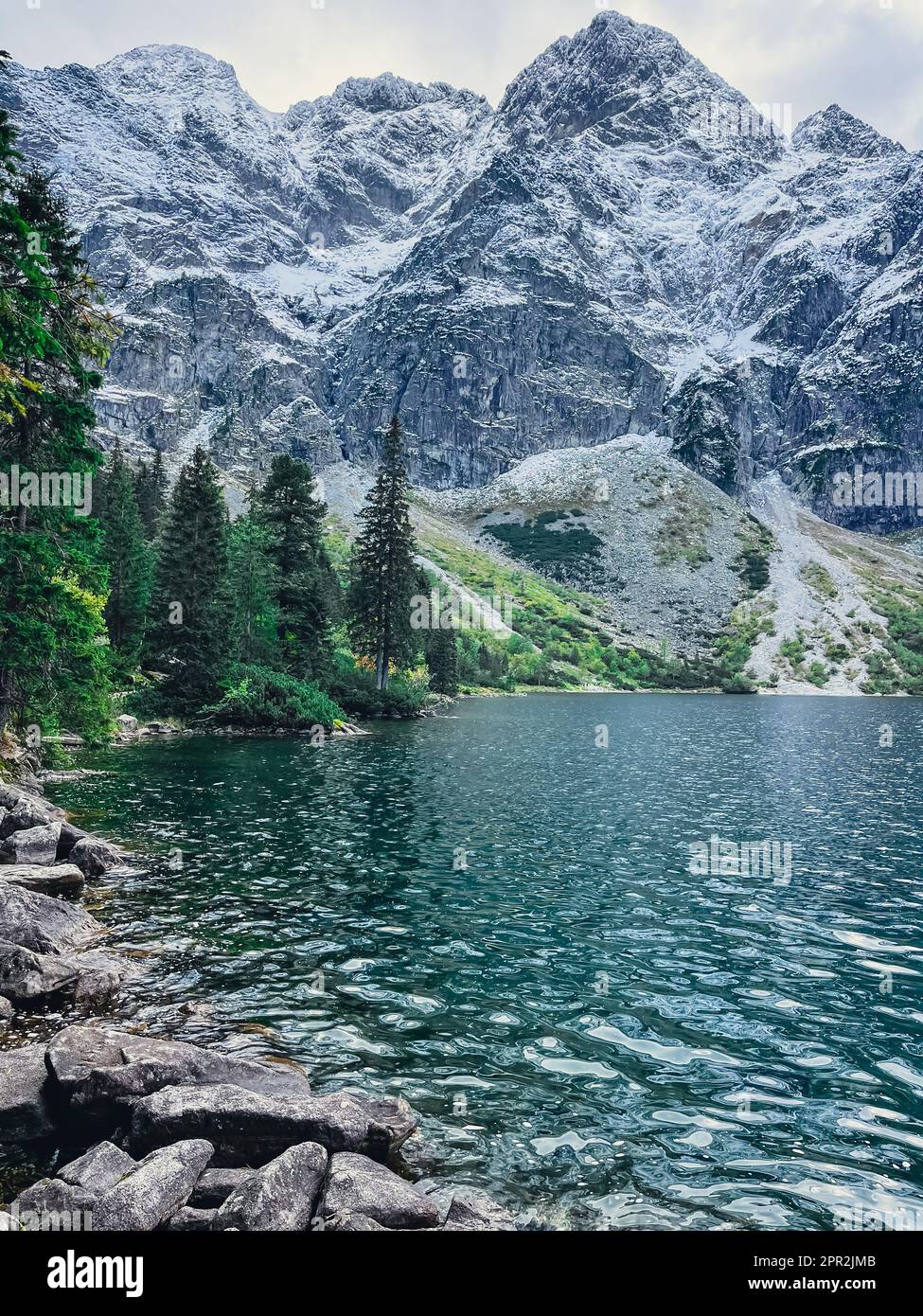 Morskie Oko lake Snowy Mountain Hut in Polish Tatry mountains, Zakopane ...