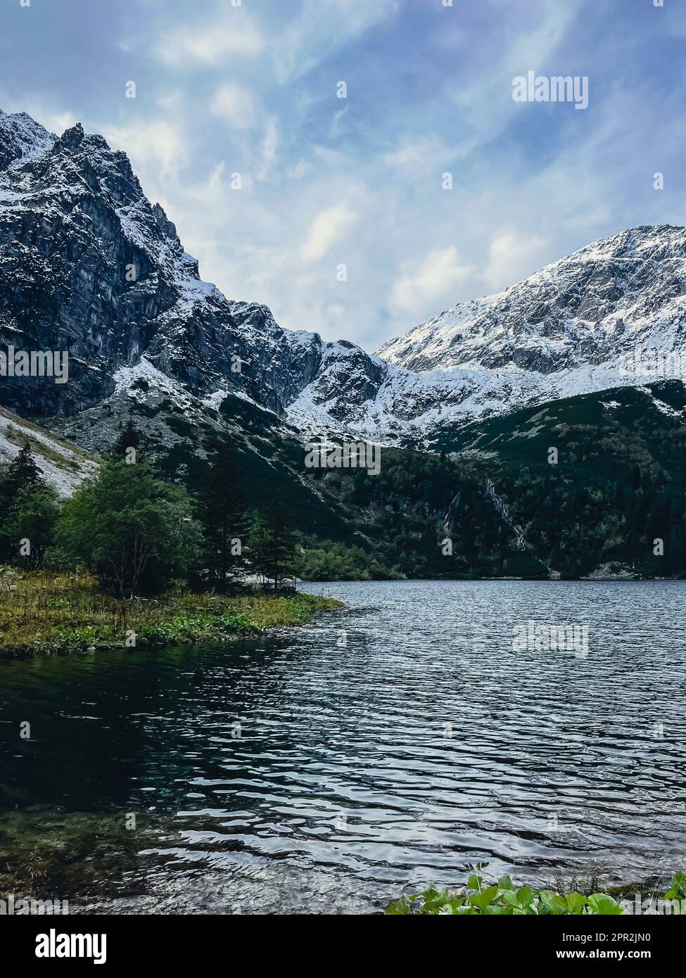 Morskie Oko lake Snowy Mountain Hut in Polish Tatry mountains, Zakopane ...