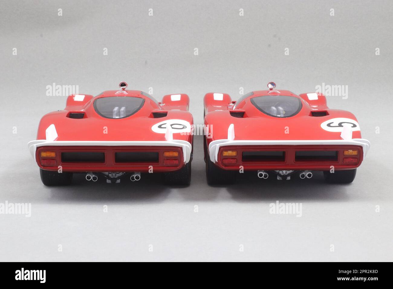 a red race car with white numbers and a number on it and toy Stock ...