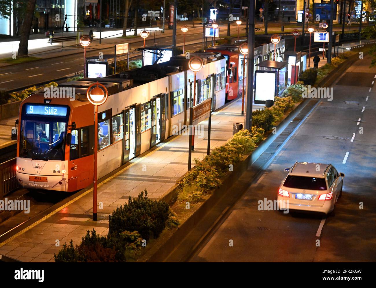 Cologne, Germany. 26th Apr, 2023. A streetcar and a car cross the ...