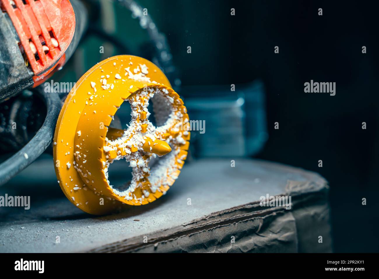 XPS or EPS Cutterr for Polystyrene Sheets close-up in foam chips. Tool ...