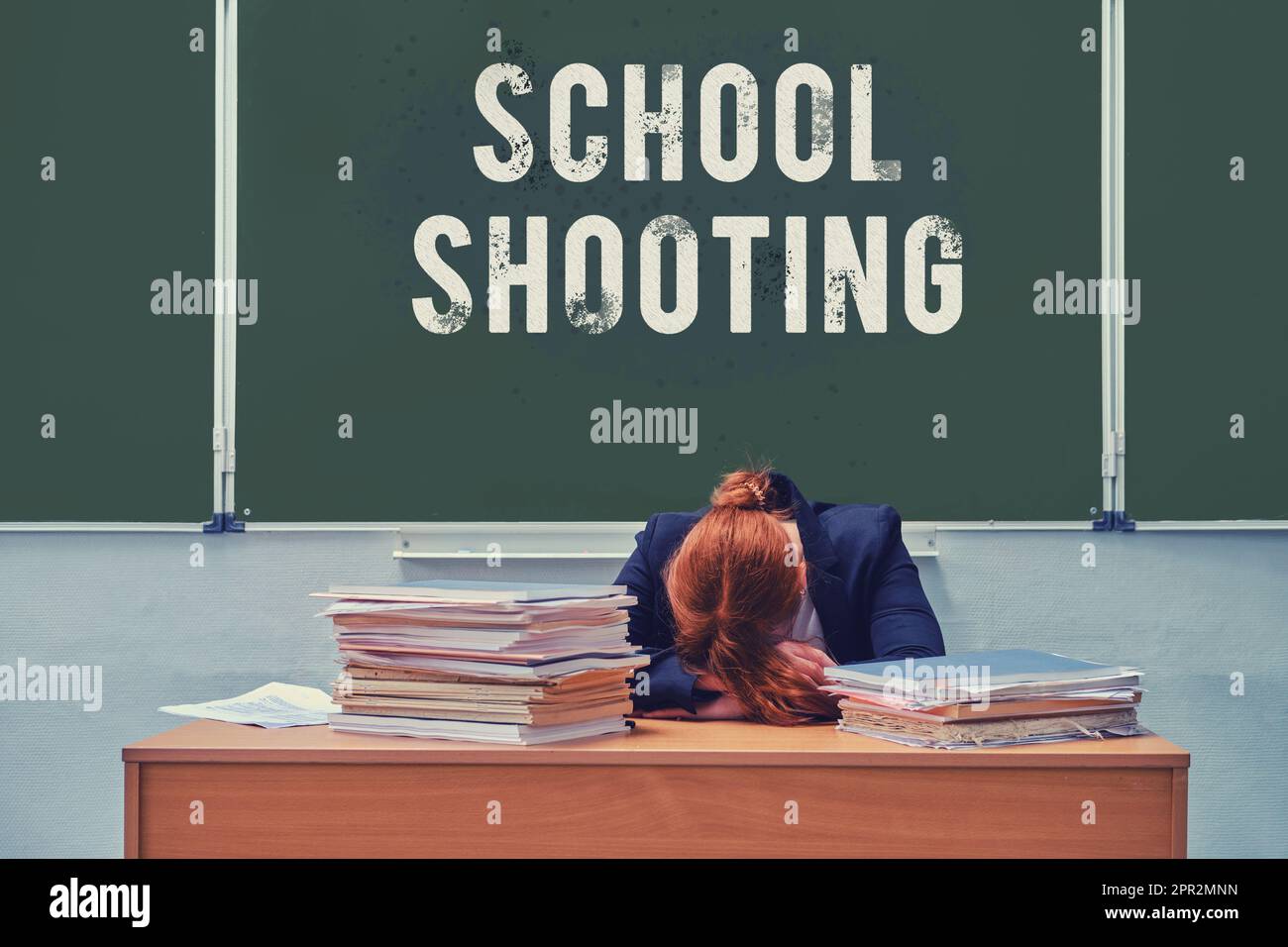 Text school shooting on the blackboard and sad teacher in the classroom ...