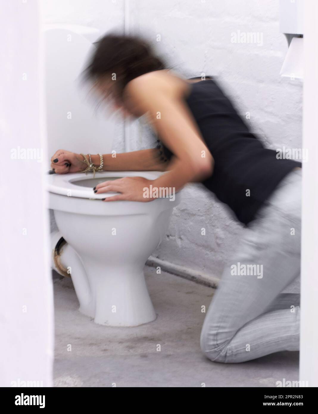 Female vomiting toilet hi-res stock photography and images - Alamy