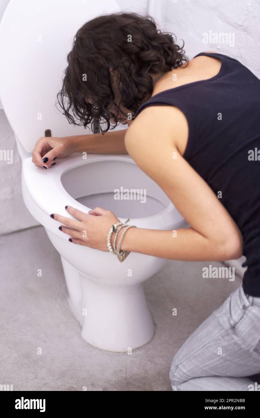 Female vomiting toilet hi-res stock photography and images - Alamy