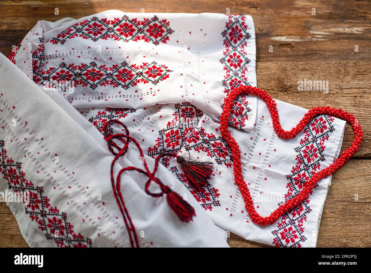 Ukrainian clothes embroidered white shirt. Red and black threads on a ...