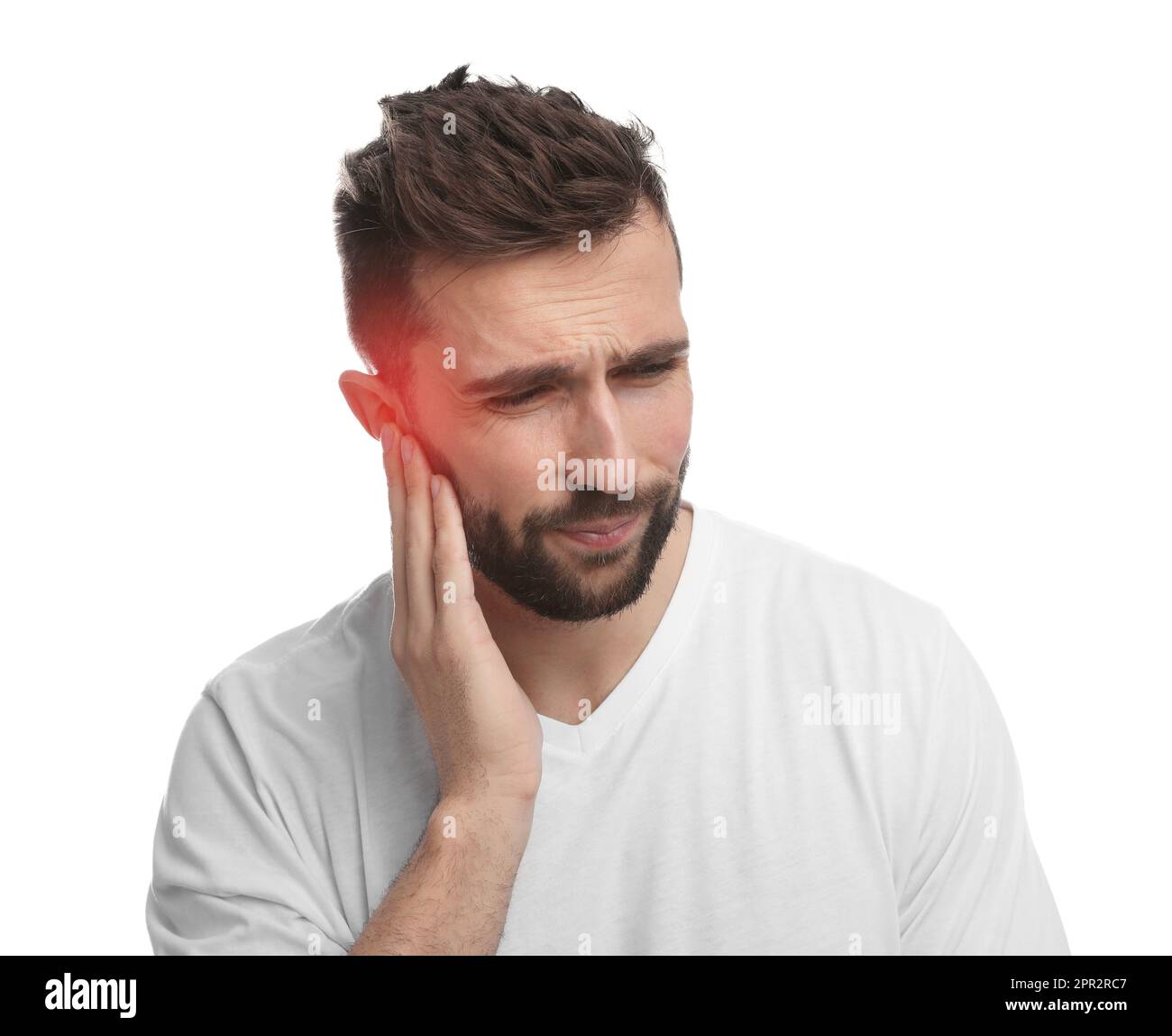 Man suffering from ear pain on white background Stock Photo - Alamy