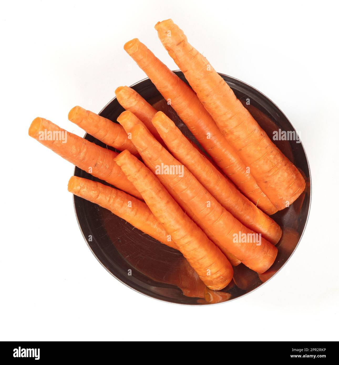 Pile of fresh carrot sticks in a bowl isolated on white Stock Photo - Alamy