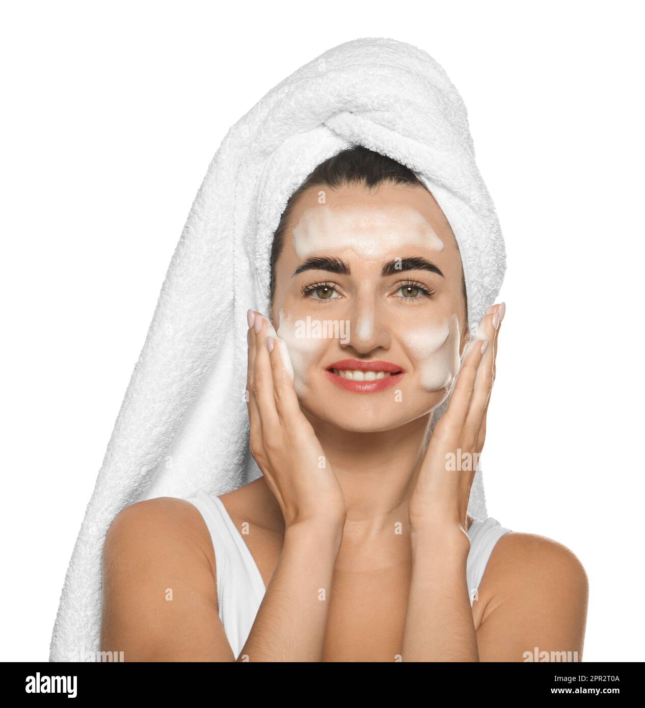Beautiful woman applying cleansing foam onto face against white background Stock Photo - Alamy
