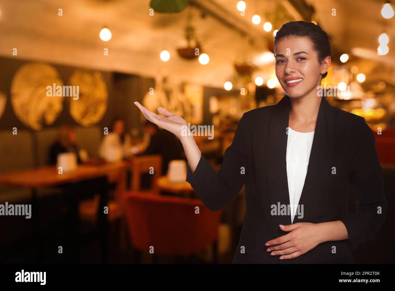 Portrait of hostess wearing uniform in cafe. Space for text Stock Photo ...